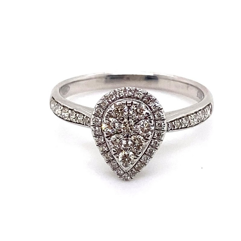 Diamonds Set In The Raised Pear Shaped Setting With Diamonds Set In The ...